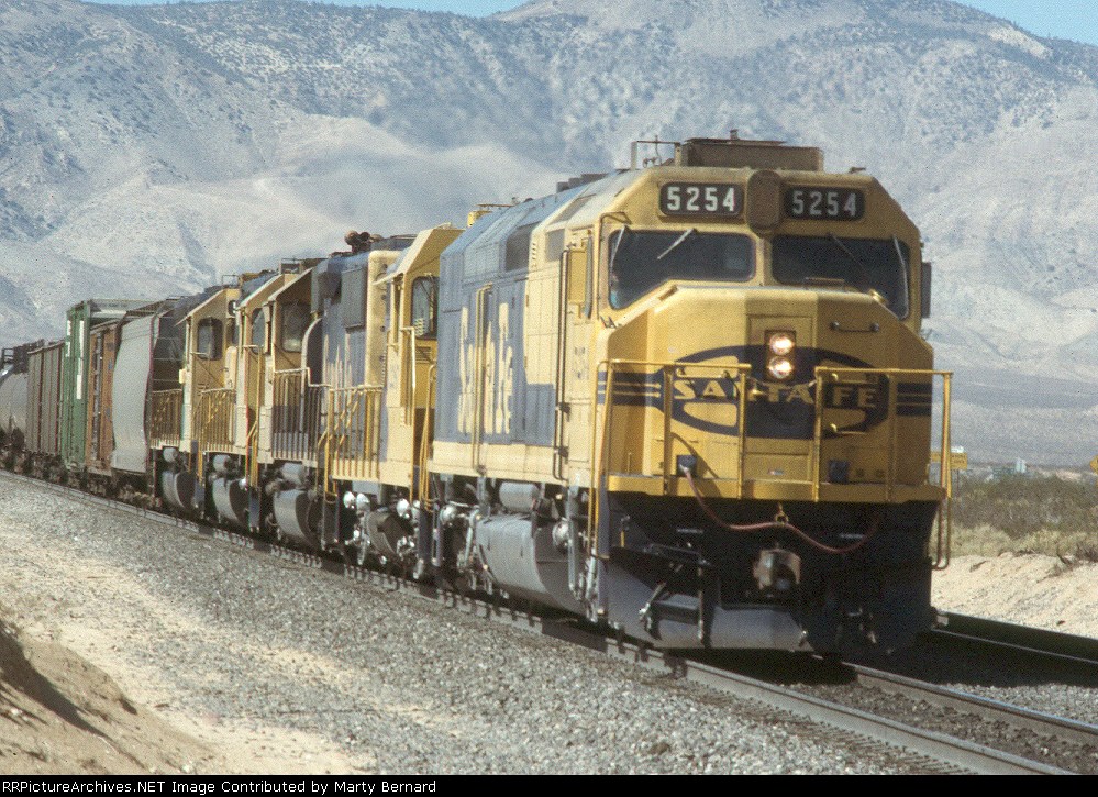 AT&SF 5254 (ex Amtrak 635) at Mid-life with Freight and Sisters in 1990